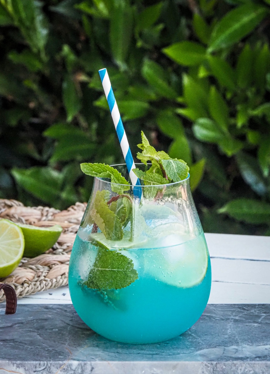 Elevate your summer cocktail experience sipping on a delicious Blue ...